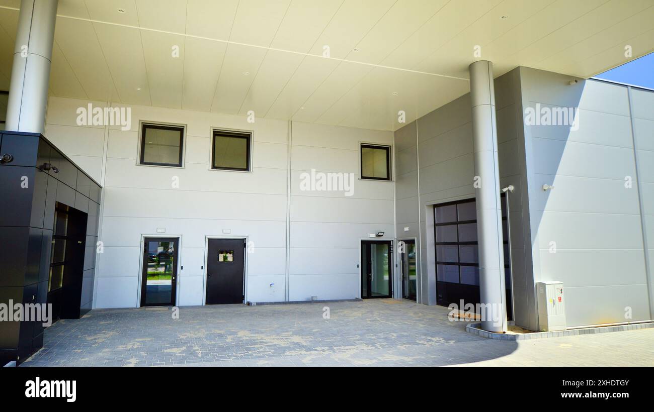 Empty new constructed automobile dealership. The building contains a ...