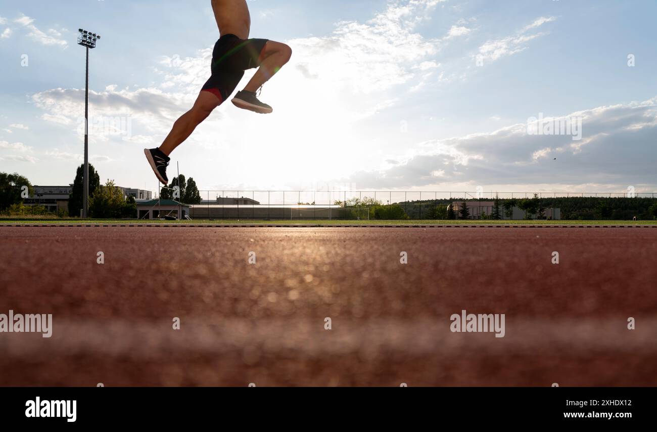 Male runner in mid hi-res stock photography and images - Alamy