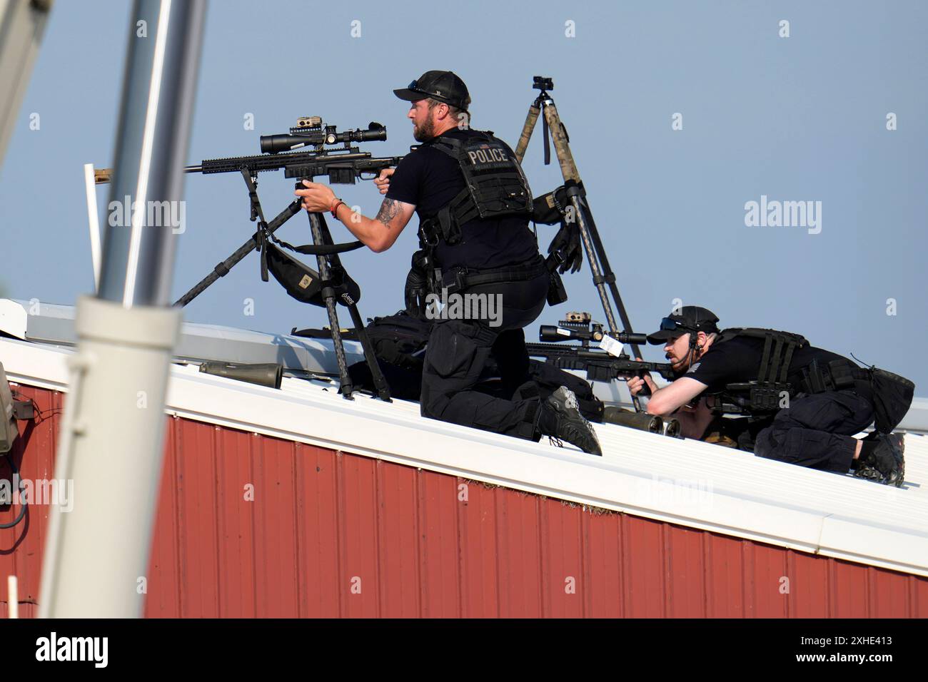 Police snipers return fire after shots were fired while Republican ...