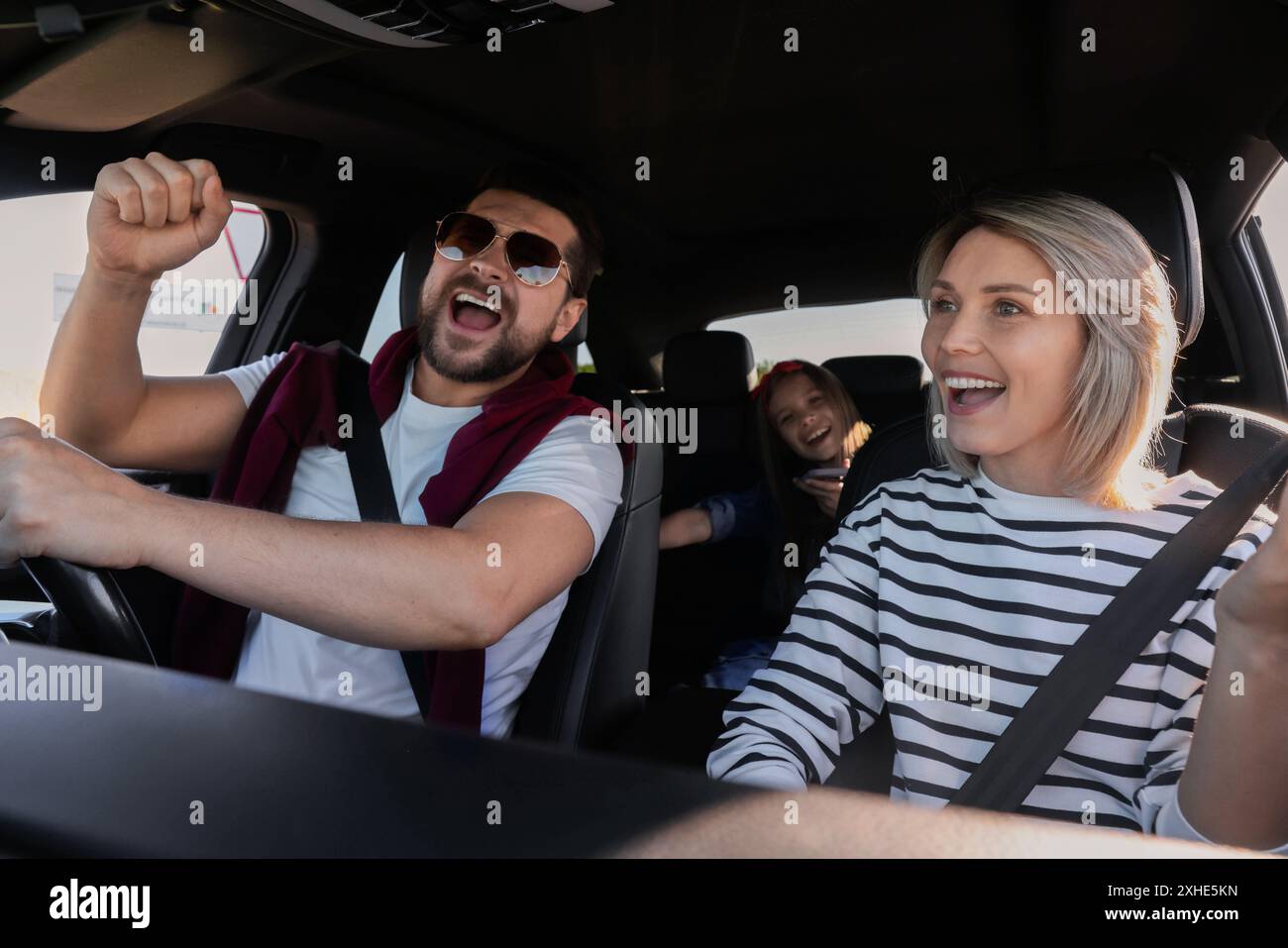 Family singing in the car hi-res stock photography and images - Alamy