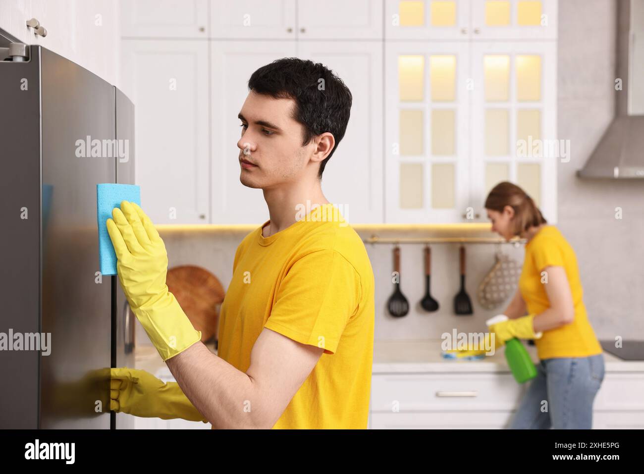 Professional janitors working in kitchen. Cleaning service Stock Photo ...