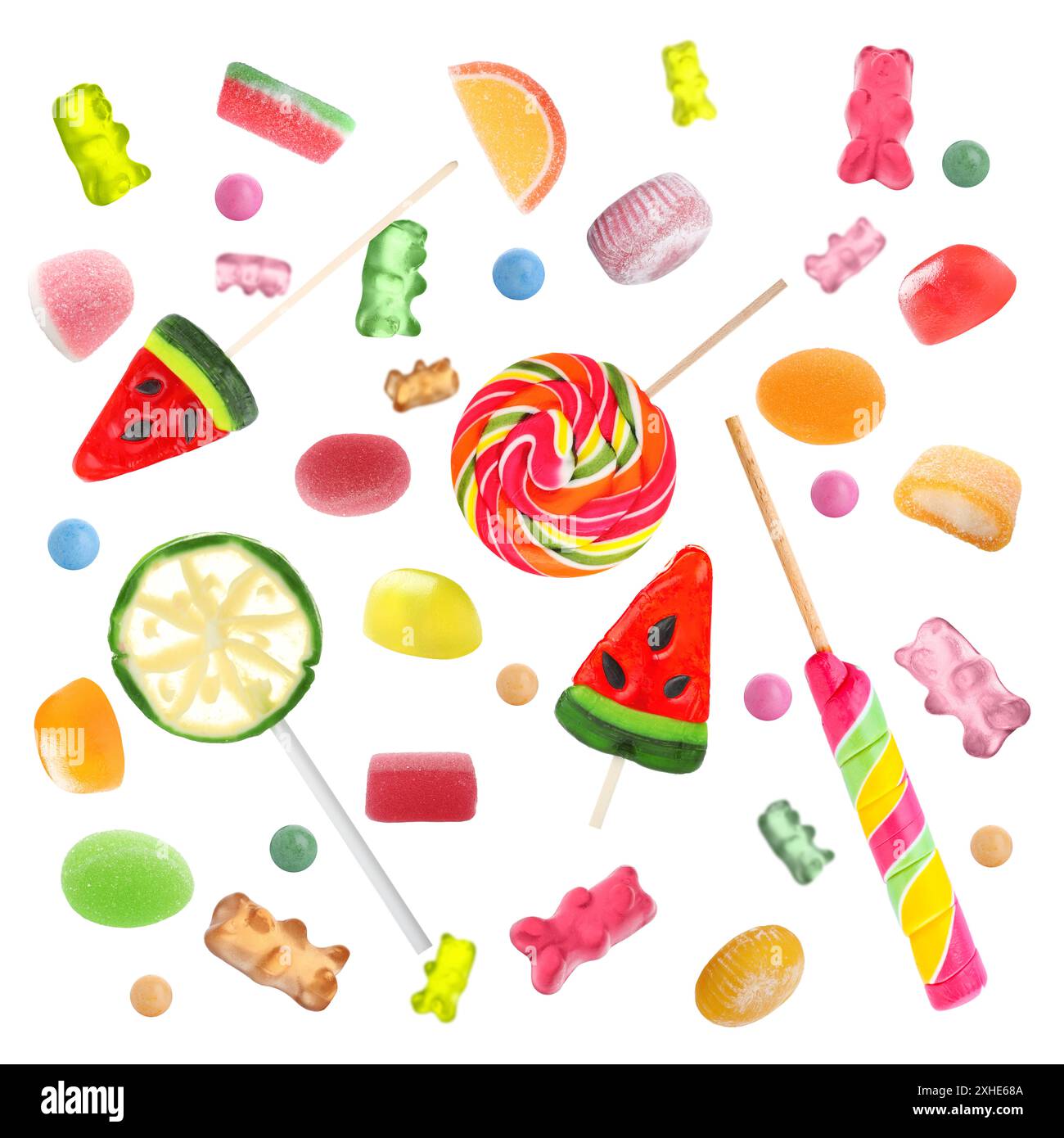 Different sweet candies in air on white background Stock Photo - Alamy