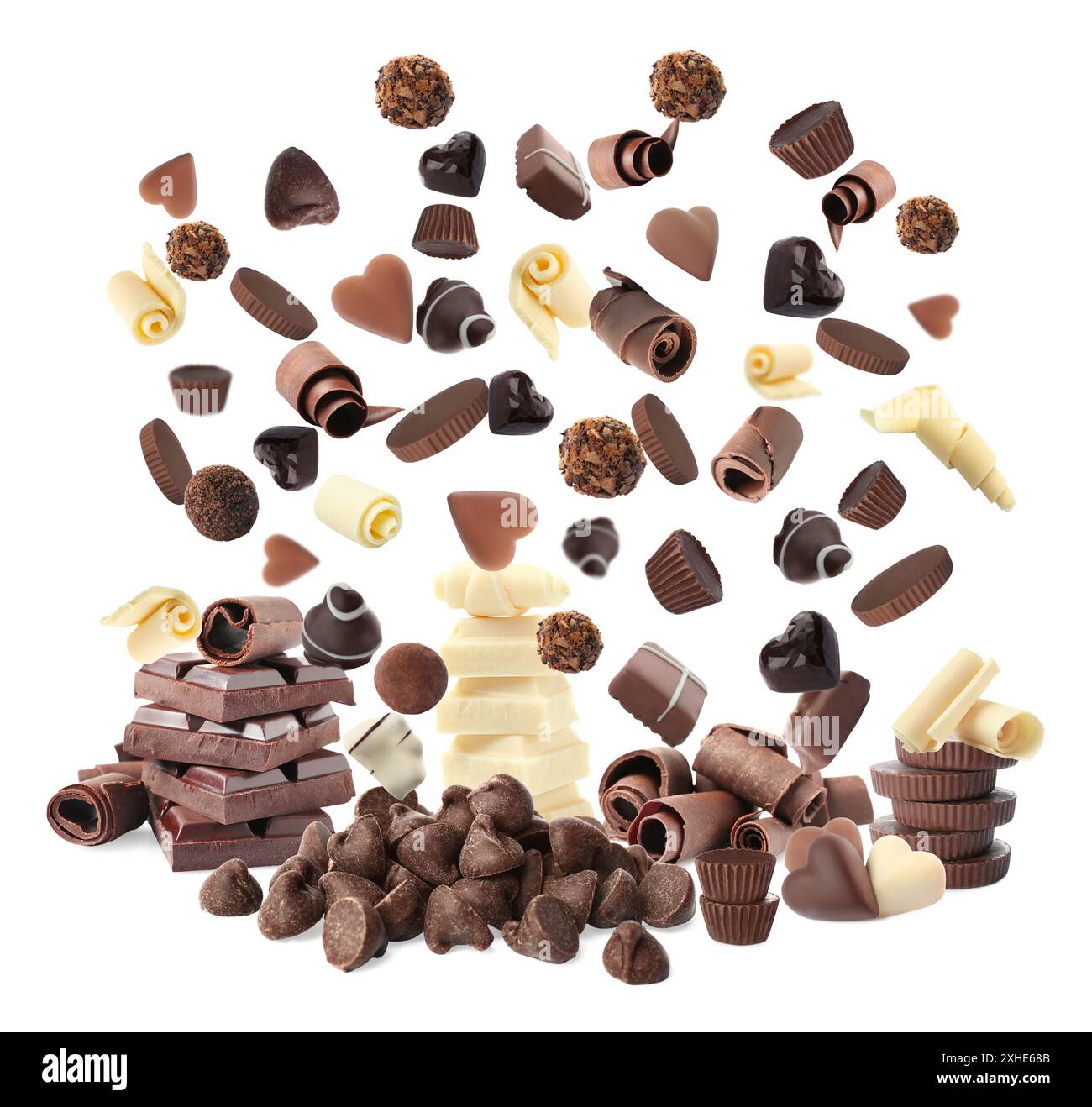 Sweet chocolate candies falling on white background Stock Photo - Alamy