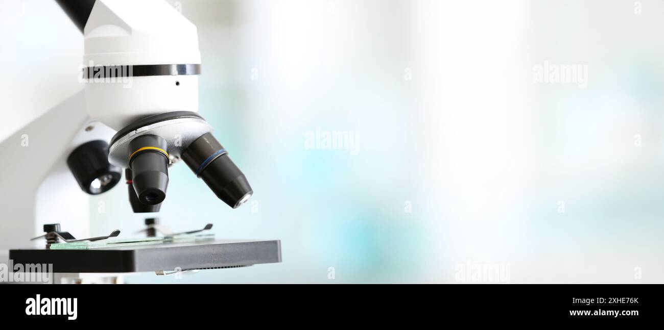 Microscope on blurred background hi-res stock photography and images ...