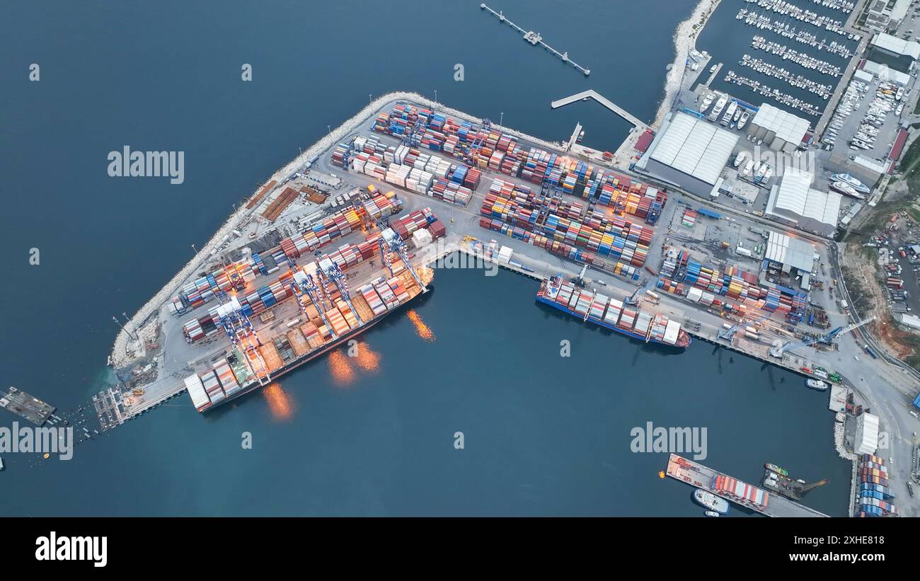 Aerial top view of Container ship loading and unloading, Cargo ...