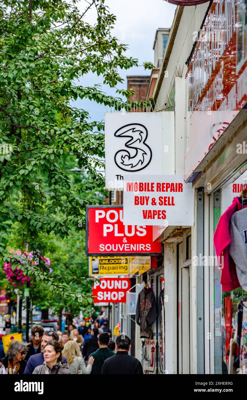 Shop signs along a street in London, UK Stock Photo - Alamy