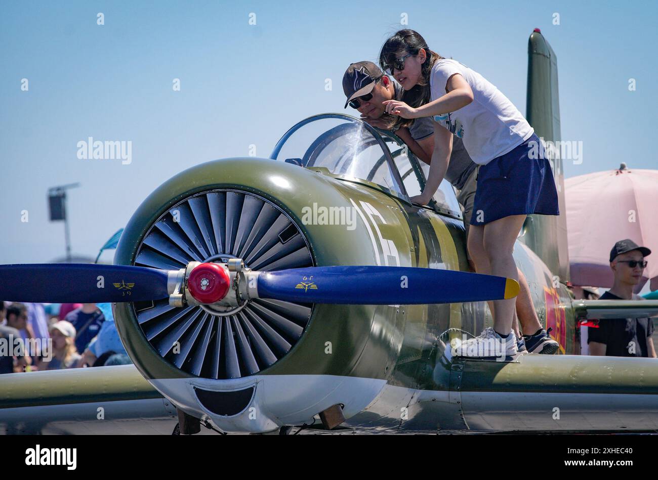 Delta, Canada. 13th July, 2024. People view an aircraft displayed at ...