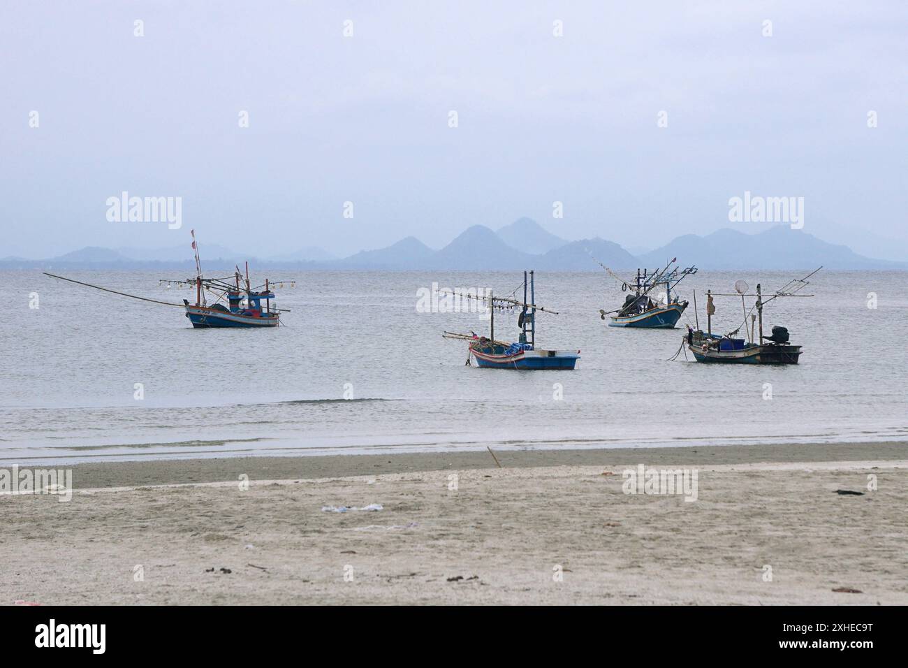 fishing boat in the sea with nature background Stock Photo - Alamy