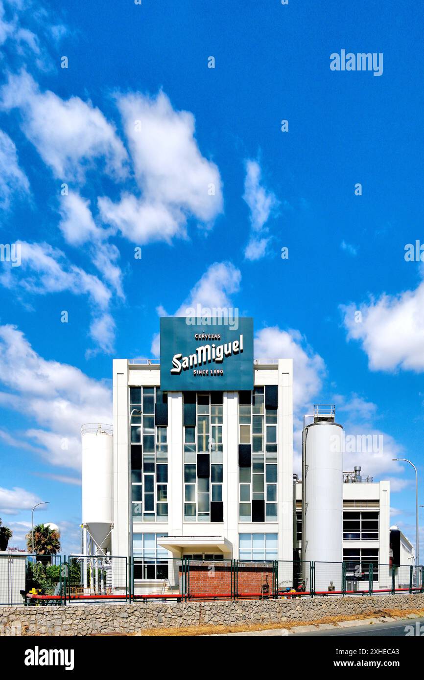 San Miguel Brewery factory buildings in Malaga against deep blue sky ...
