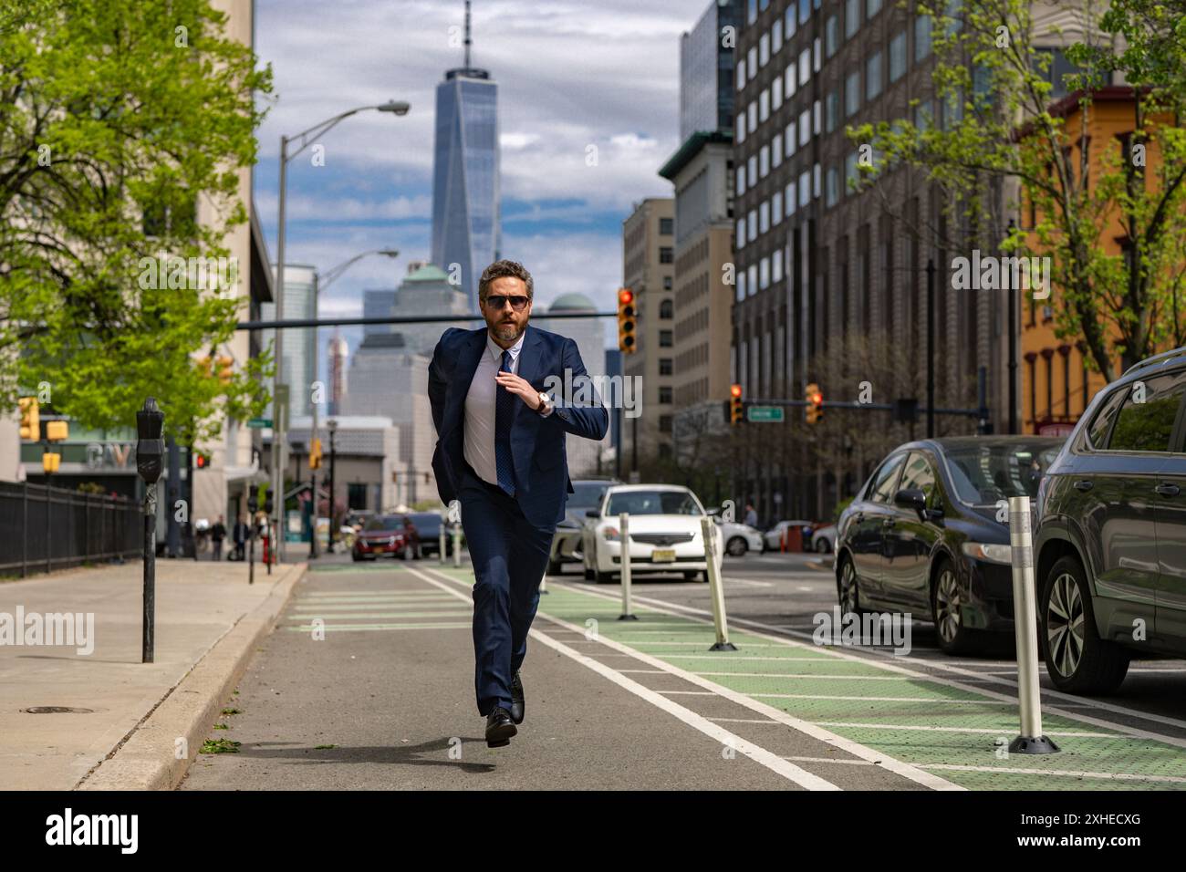 Business man run in NY. American business. Businessman run down street ...