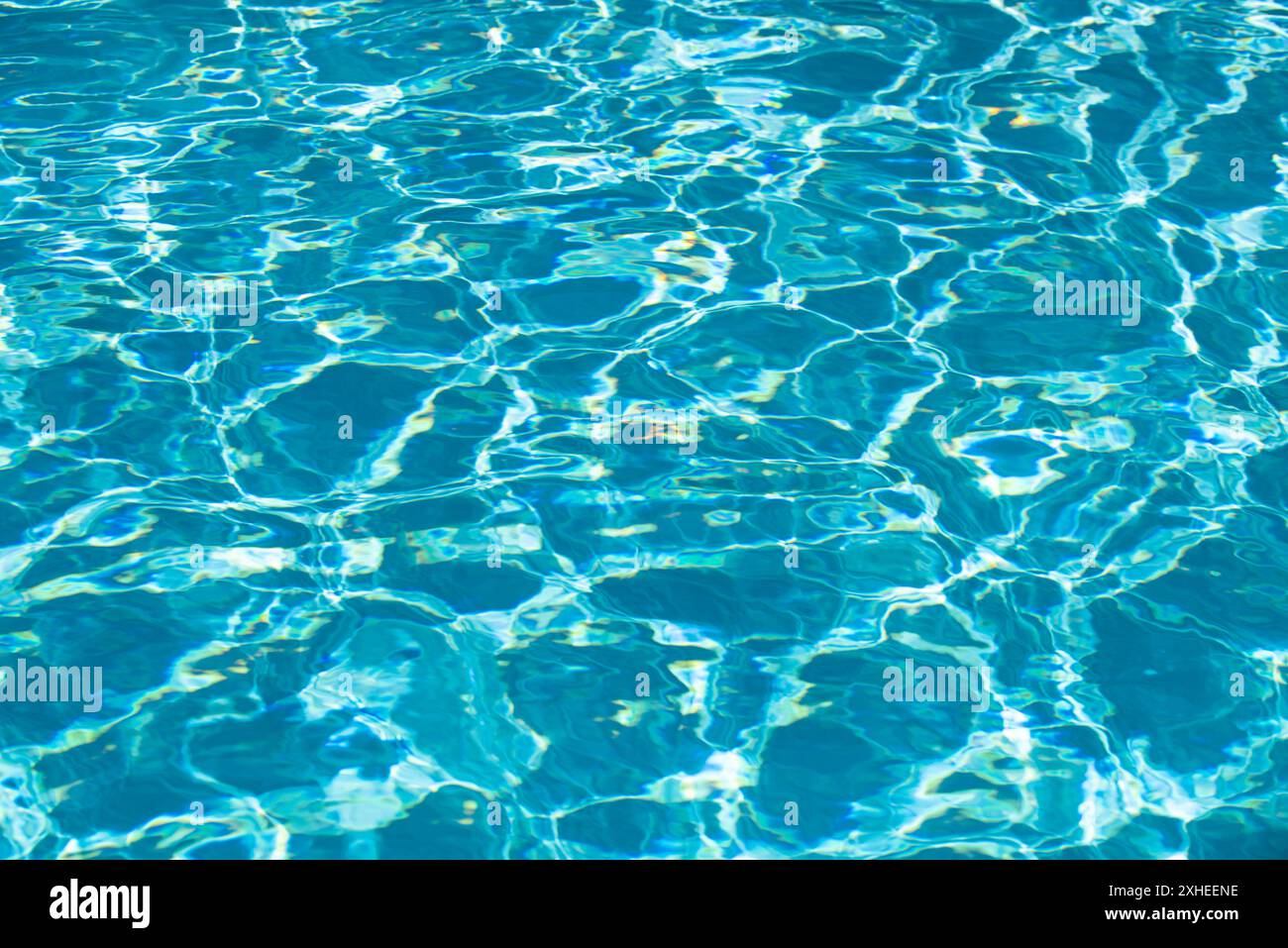 Water background. Blue water, ripples and highlights. Texture of water ...