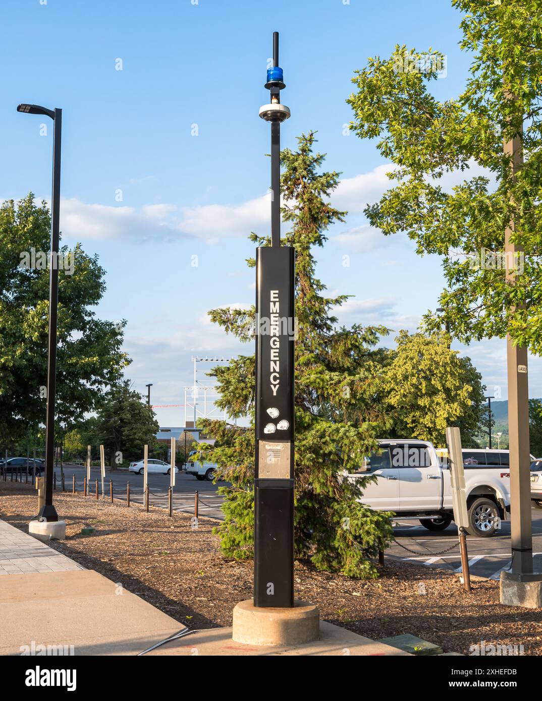 An emergency call station next to a parking lot on the campus of Penn ...