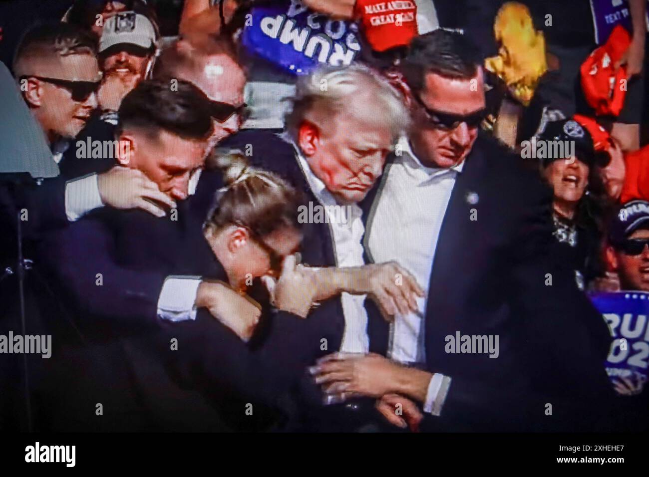 In this photo illustration, a screen shows Former US President Donald ...