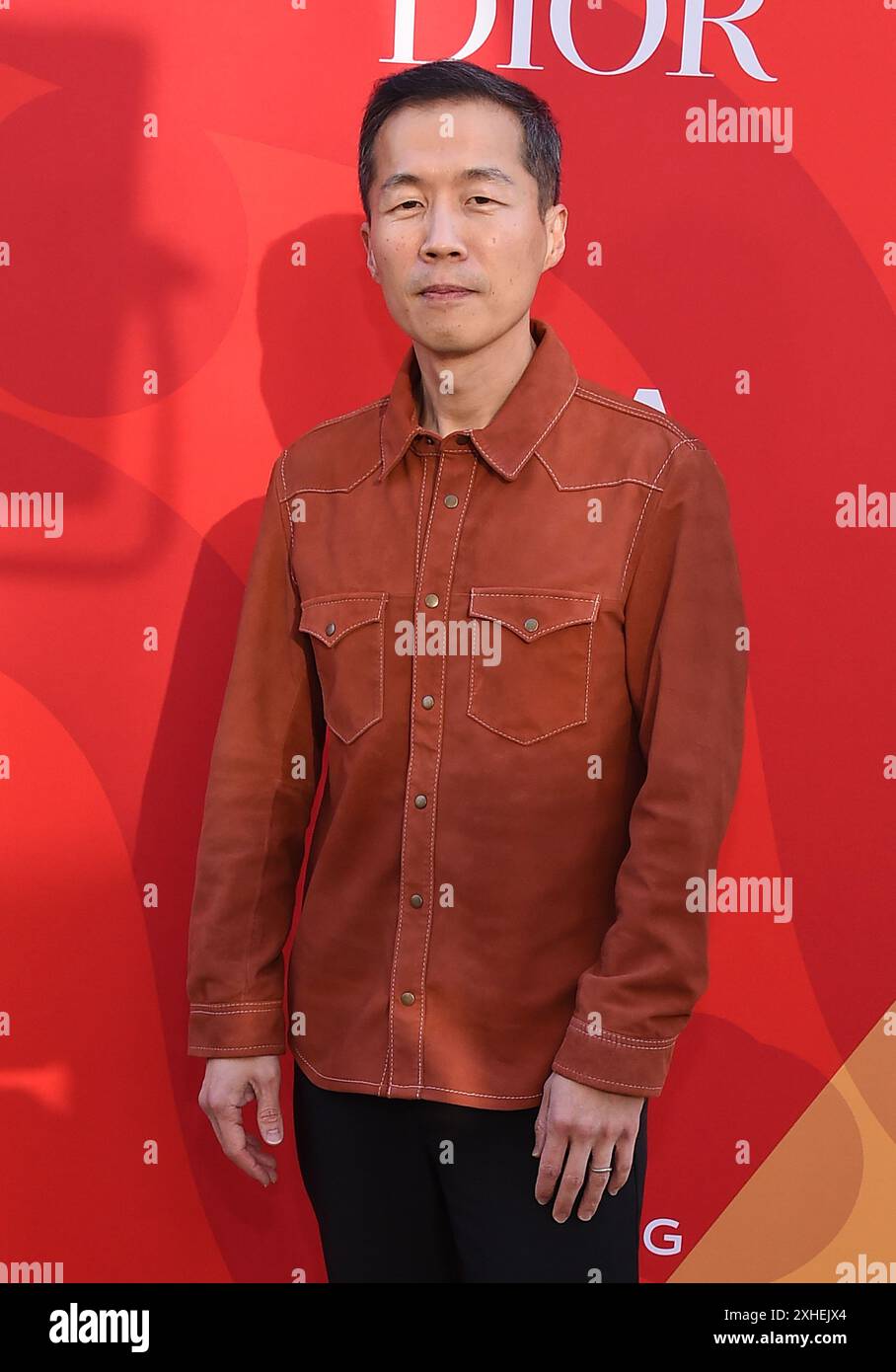 Lee Isaac Chung arriving to the Charlize Theron Africa Outreach Project ...