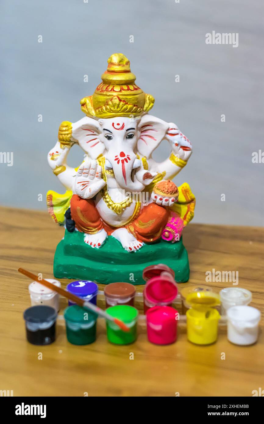 hindu holy god ganpati colorful idol with colors on the occasion of ...