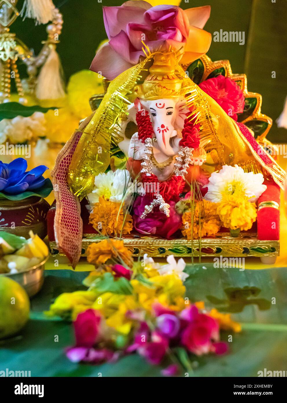 holy hindu god ganesha idol worship with holy offering and decoration ...
