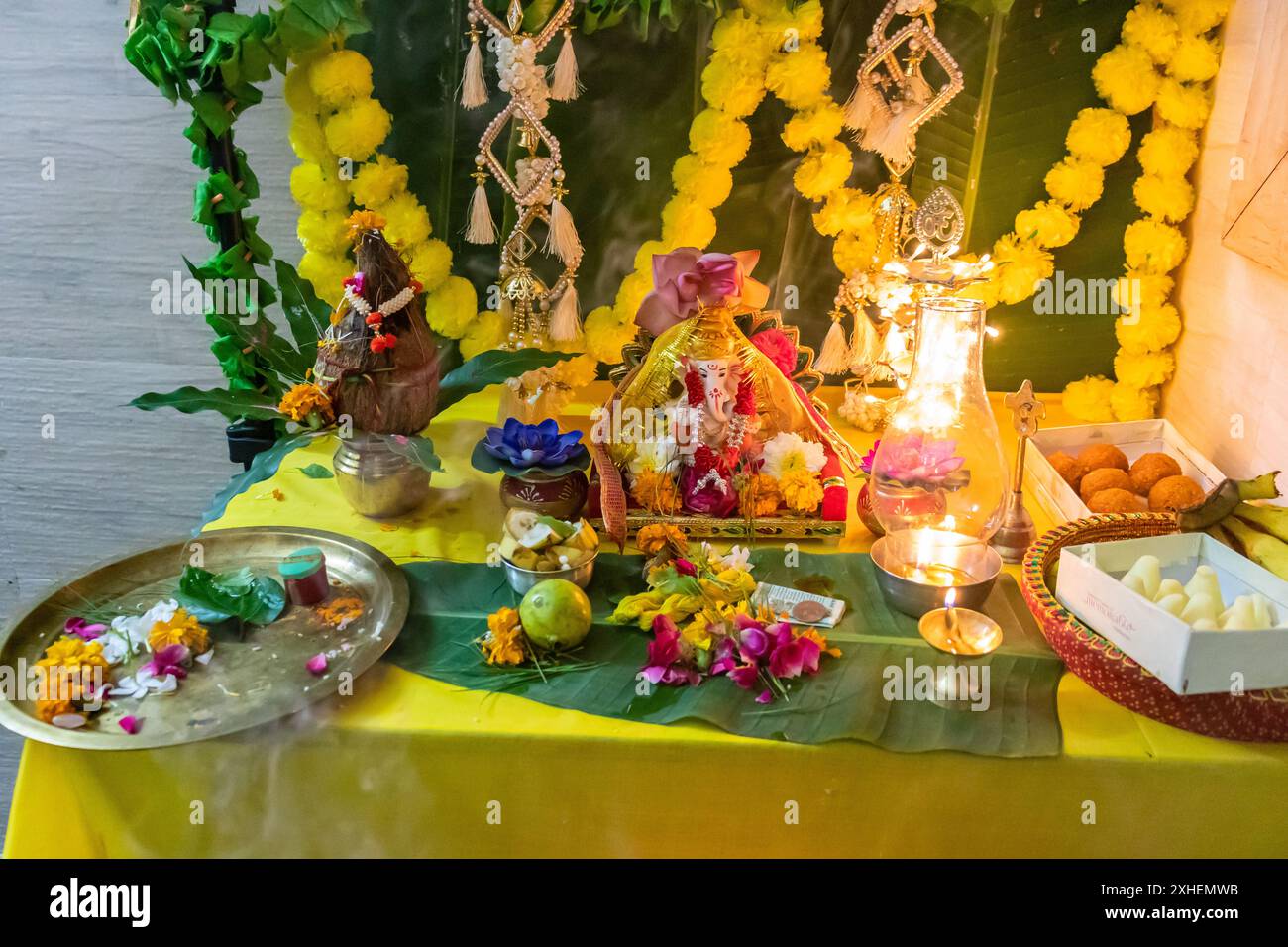 holy hindu god ganesha idol worship with holy offering and decoration ...