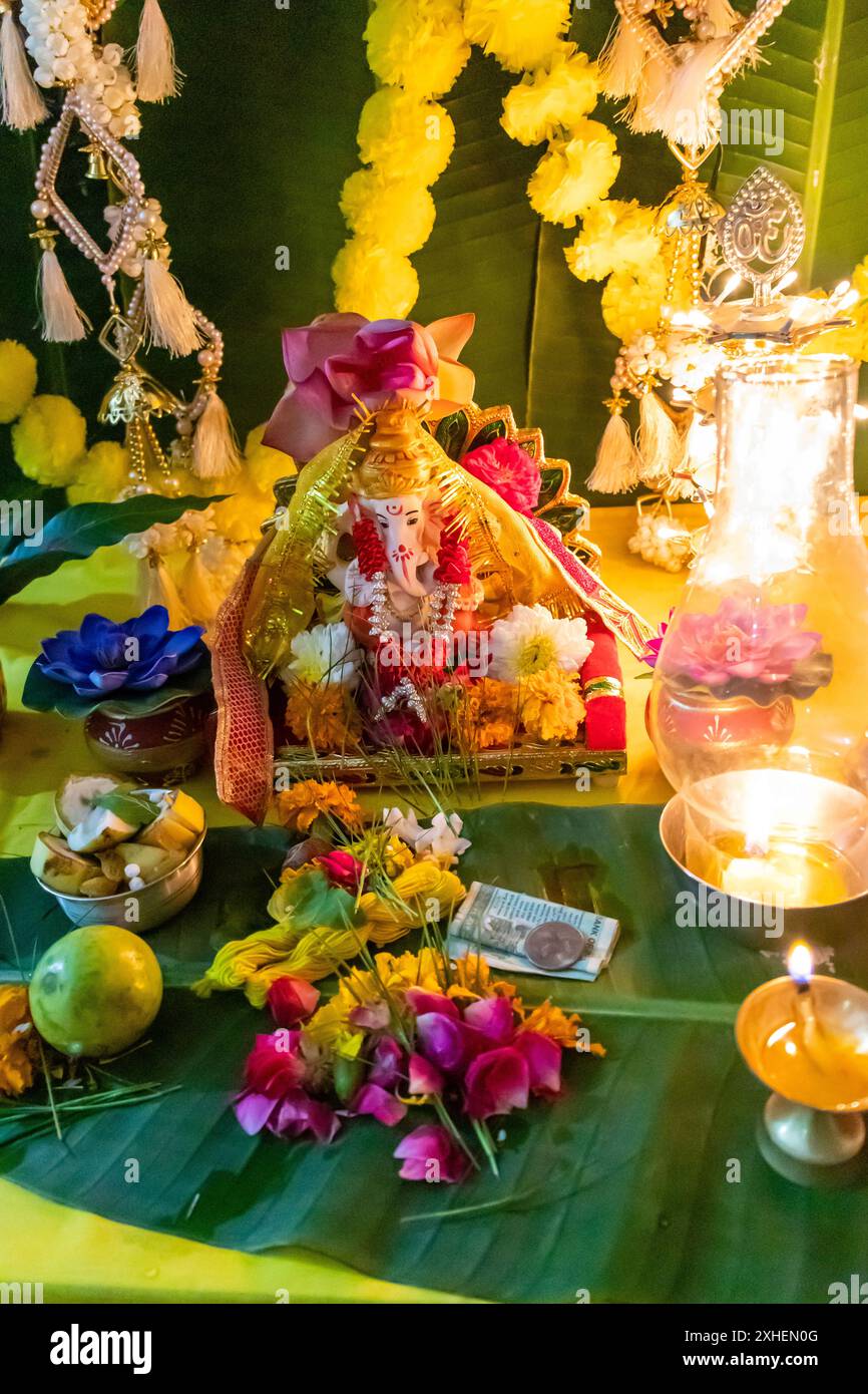 holy hindu god ganesha idol worship with holy offering and decoration ...