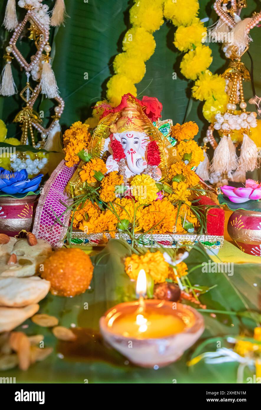 holy hindu god ganesha idol worship with holy offering and decoration ...