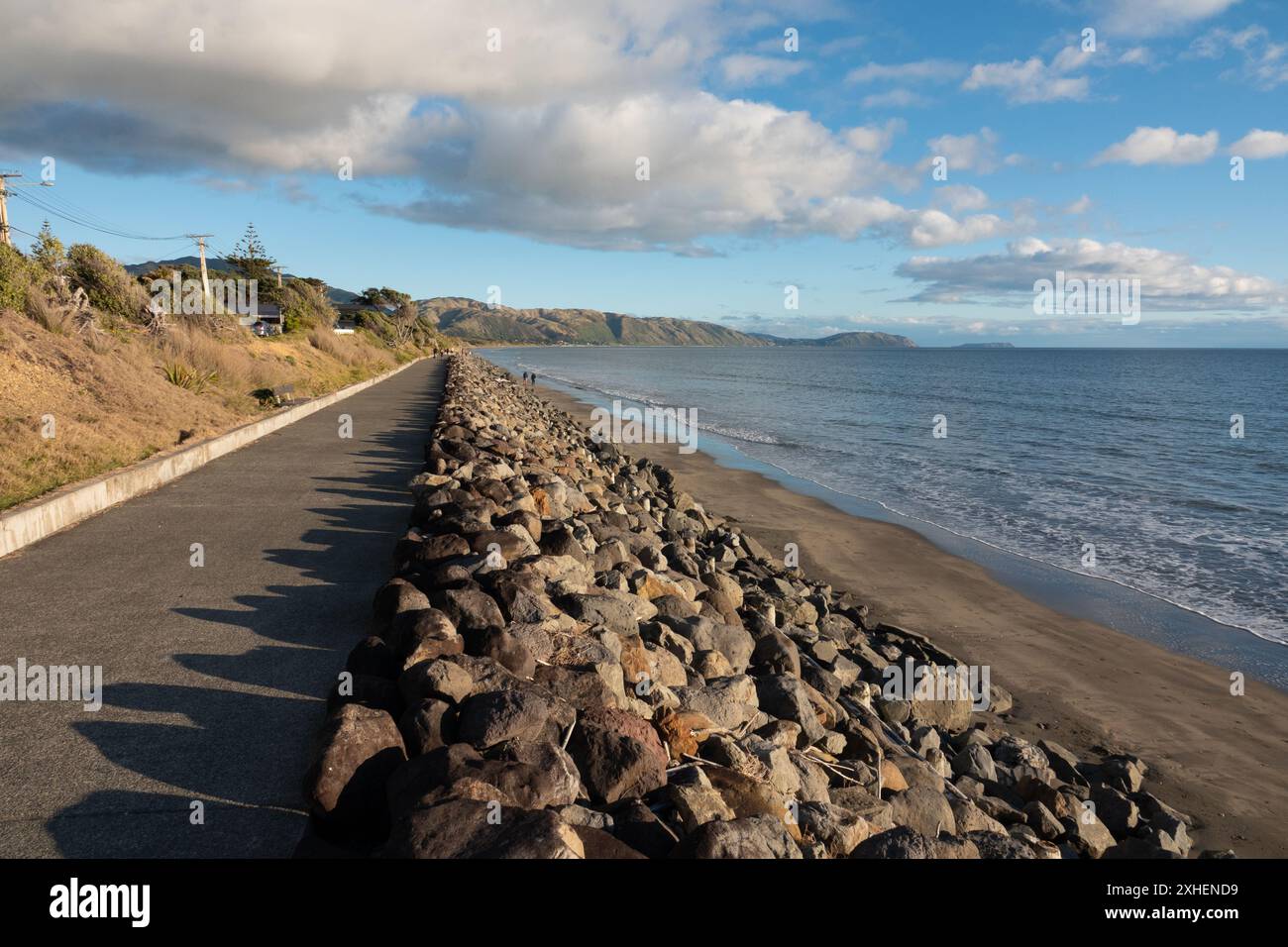 Sea walls protect houses from rising sea levels and coastal erosion on ...