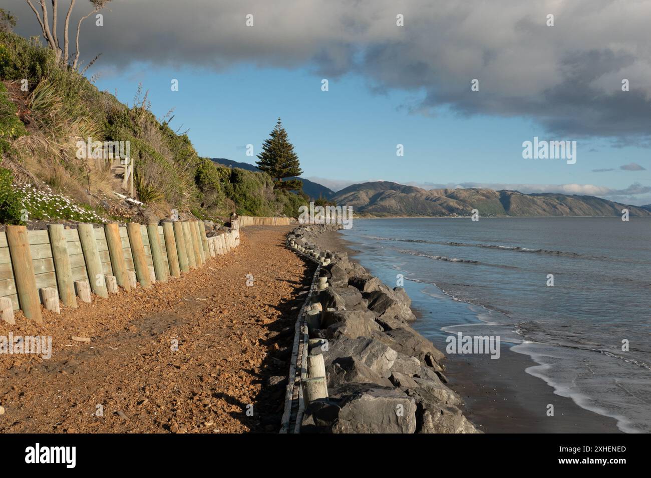Sea walls protect houses from rising sea levels and coastal erosion on ...