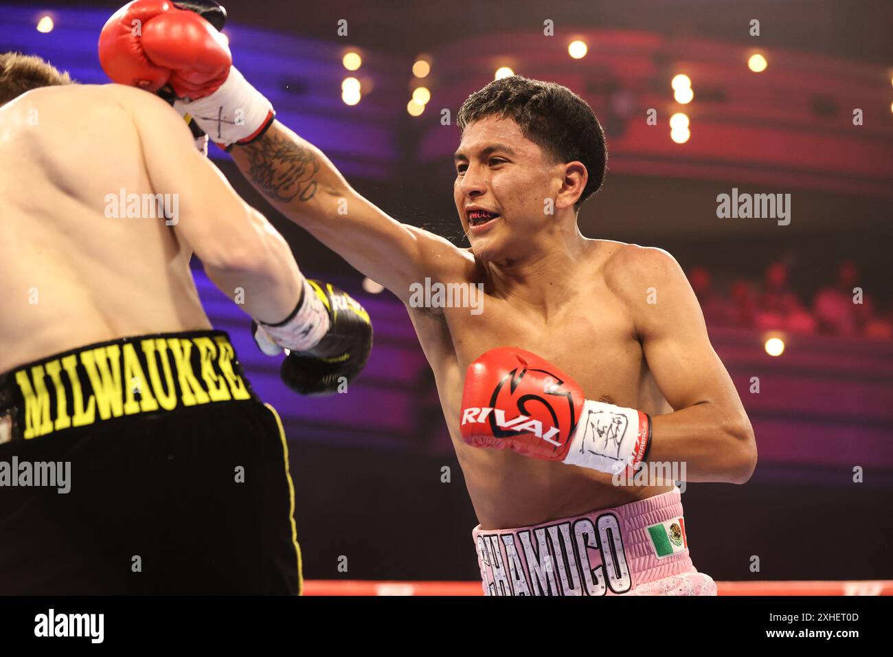 July 13, 2024: (R-L) Mikey Bracamontes punches Javier Zamarron during ...