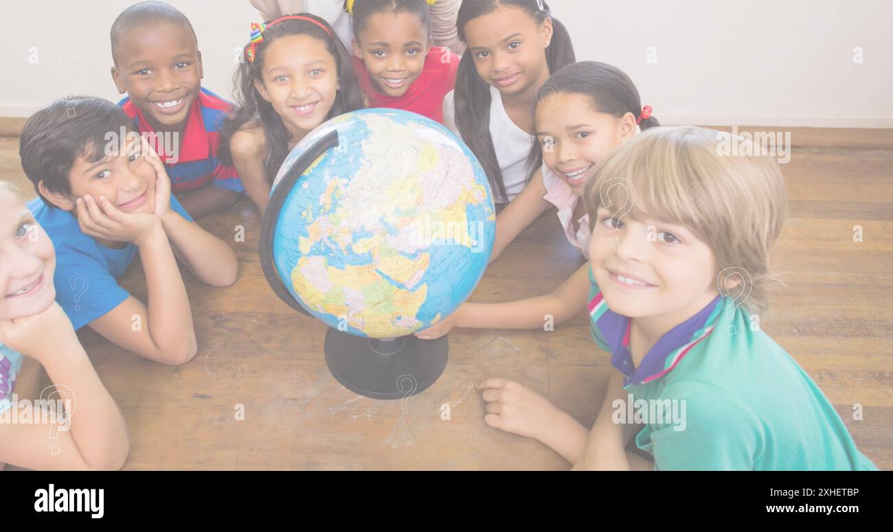 Diverse students gather around a globe at school Stock Photo - Alamy