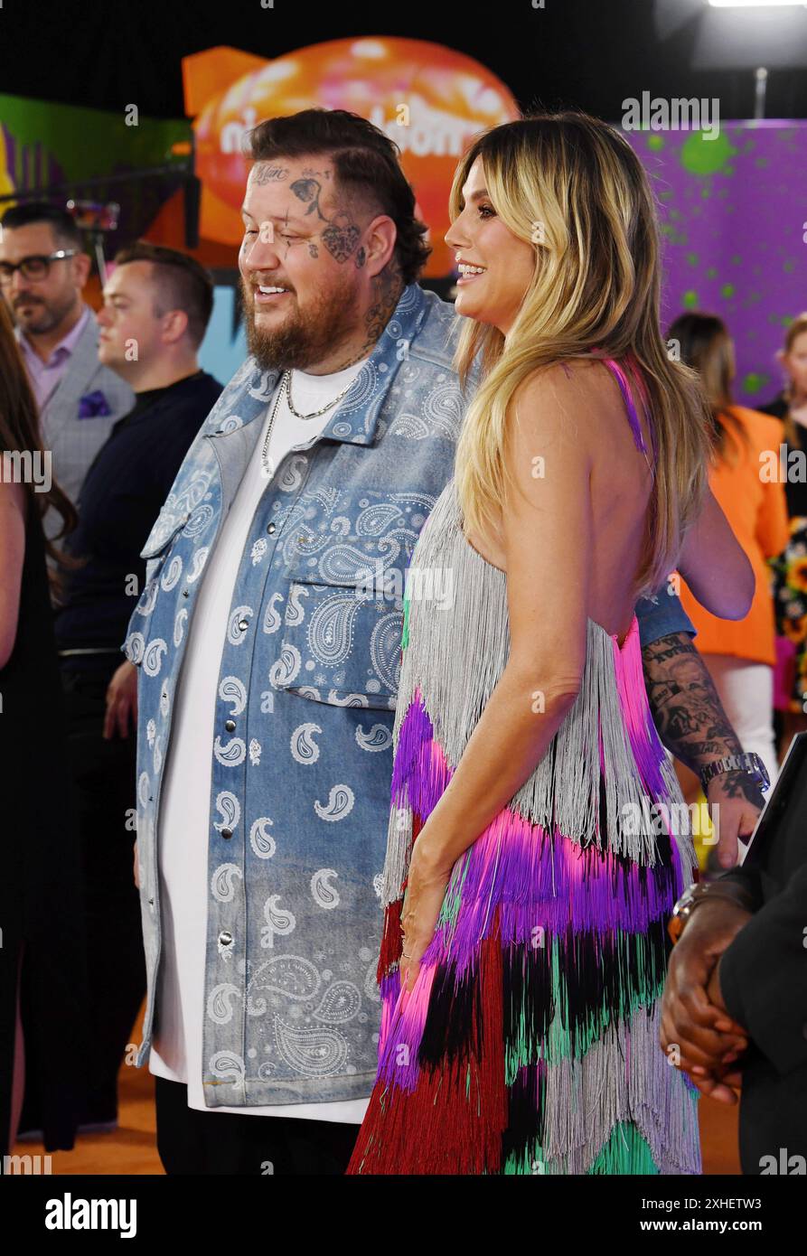 SANTA MONICA, CALIFORNIA - JULY 13: (L-R) Jelly Roll and Heidi Klum ...