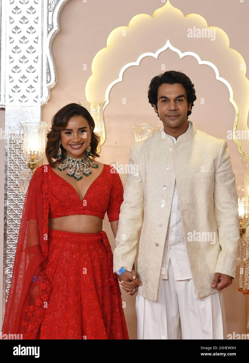 Mumbai, India. 12th July, 2024. Bollywood actor Rajkummar Rao (R) pose ...