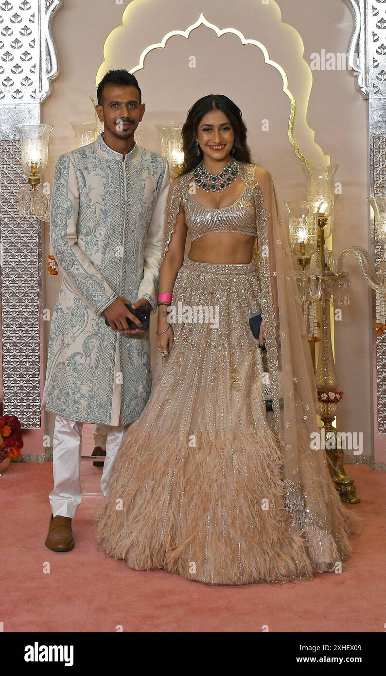 Mumbai, India. 12th July, 2024. Indian cricketer Yuzvendra Chahal pose for a photo with his wife ...