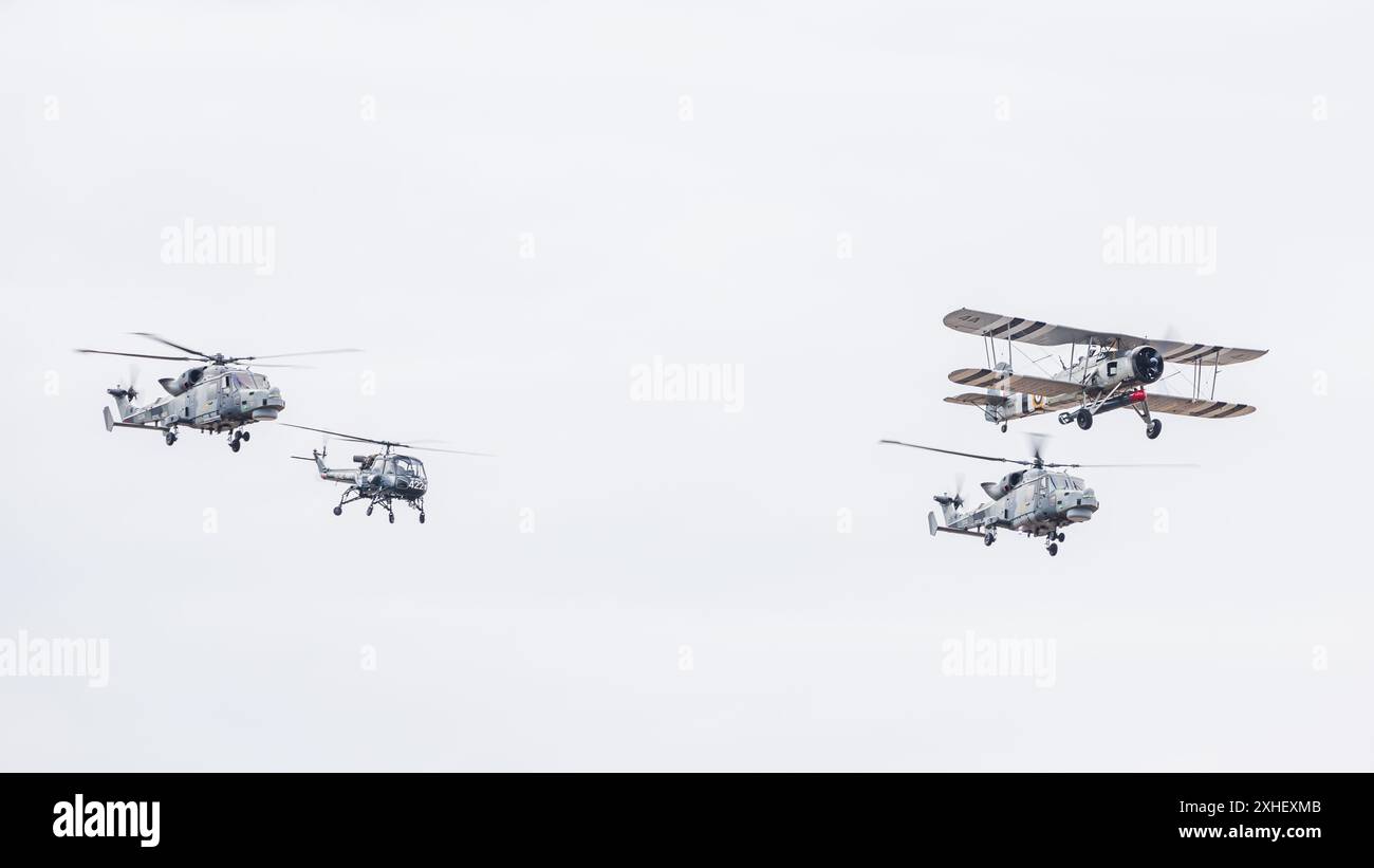 Taranto formation above Southport comrpising Westland Wasp, Royal Navy ...