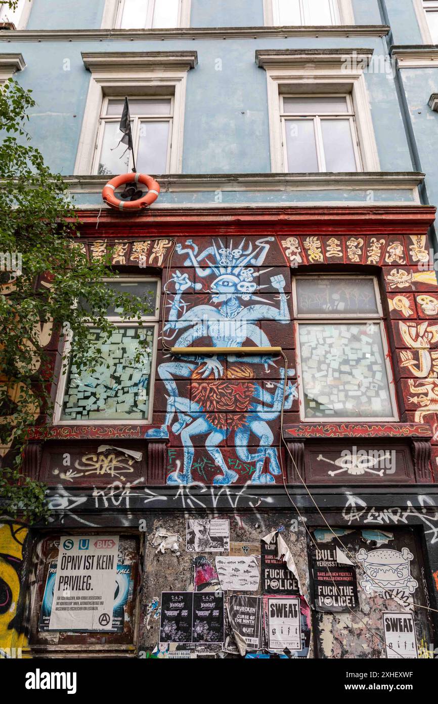 Mural graffiti and posters on building wall at Balduintreppe in St ...