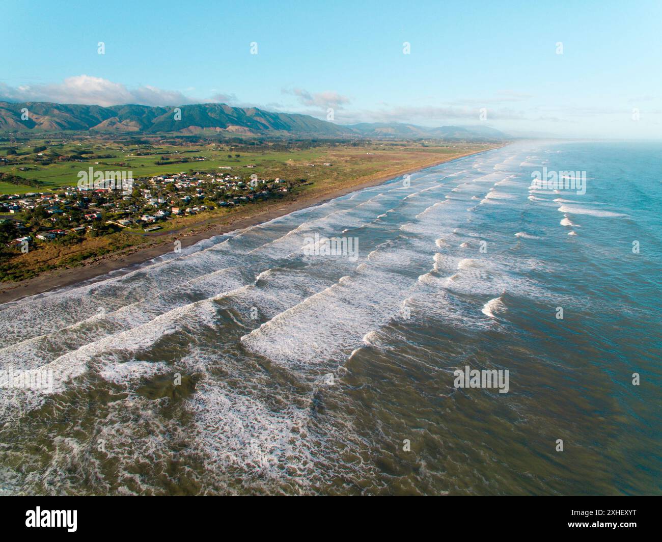 Aerial view of waves breaking along coastline at Te Horo beach, Kapiti ...