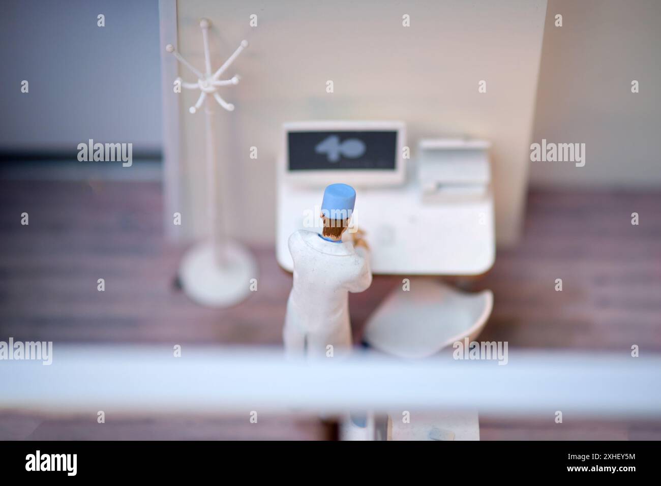 Doctor working at a computer desk in a medical office. High angle view ...