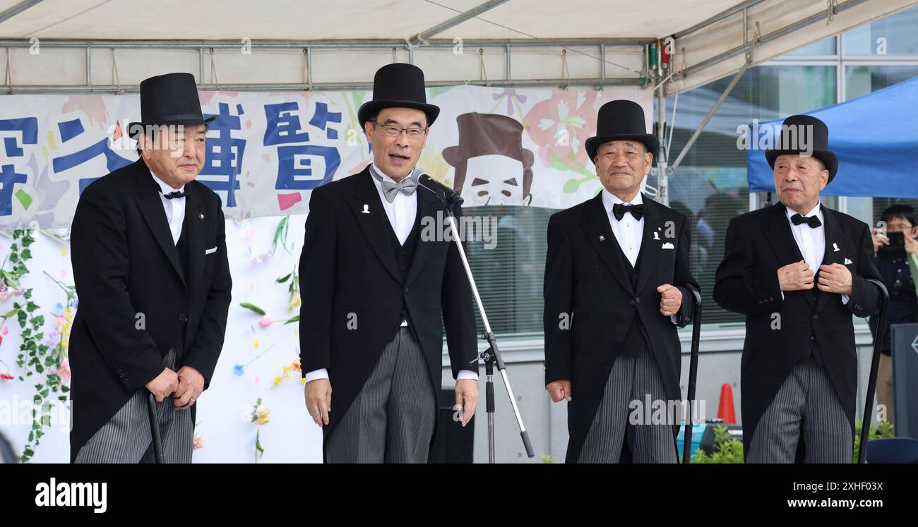 People participate in the parade to commemorate Eiichi Shibusawa, known ...
