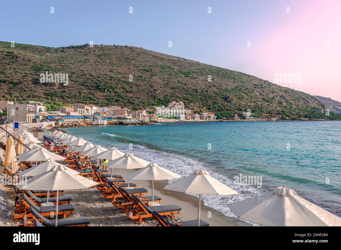 The beach and the village of Neo Oitylo, a picturesque, tiny, fishing ...