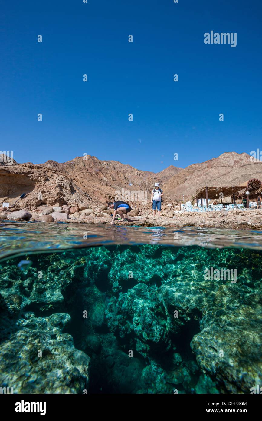 Egypt, Dahab, Blue Hole, Over-under picture of "The Bell", divers ...