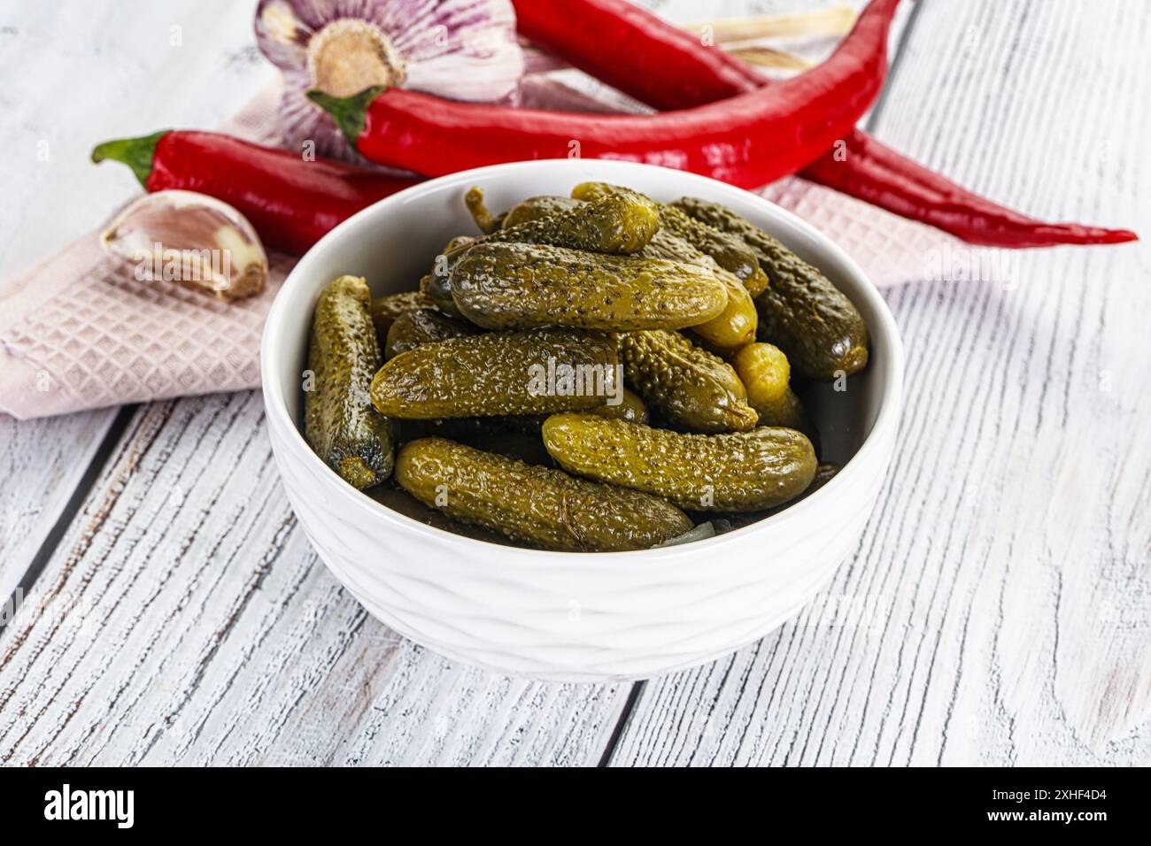 Marinated small cucumbers - cornichon - in the bowl Stock Photo - Alamy