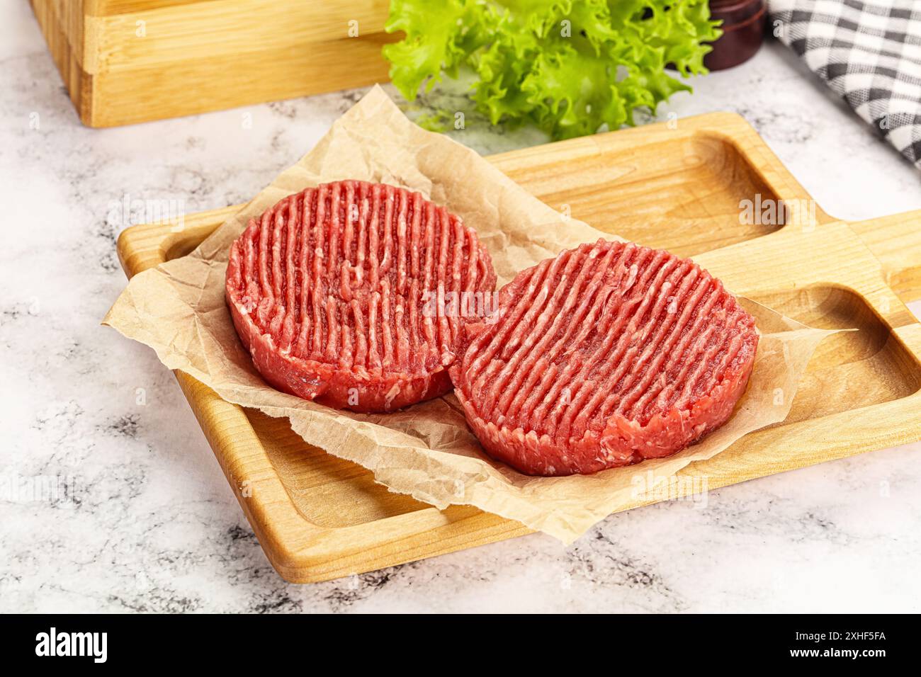 Raw beef burger cutlet minced meat for grill Stock Photo - Alamy