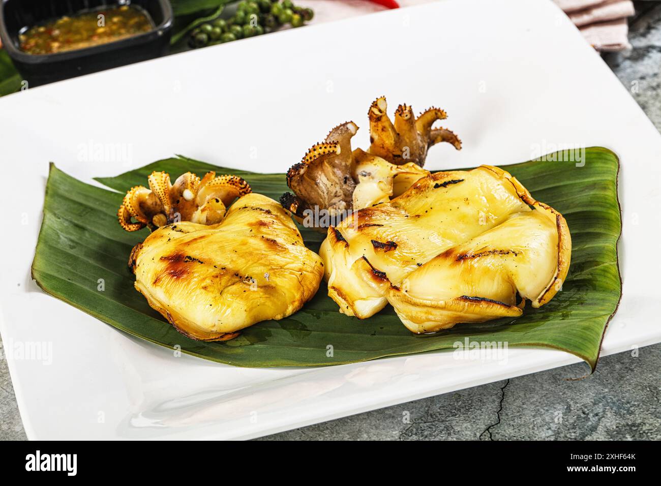 Delicous Grilled cuttlefish with sauce asian style Stock Photo - Alamy