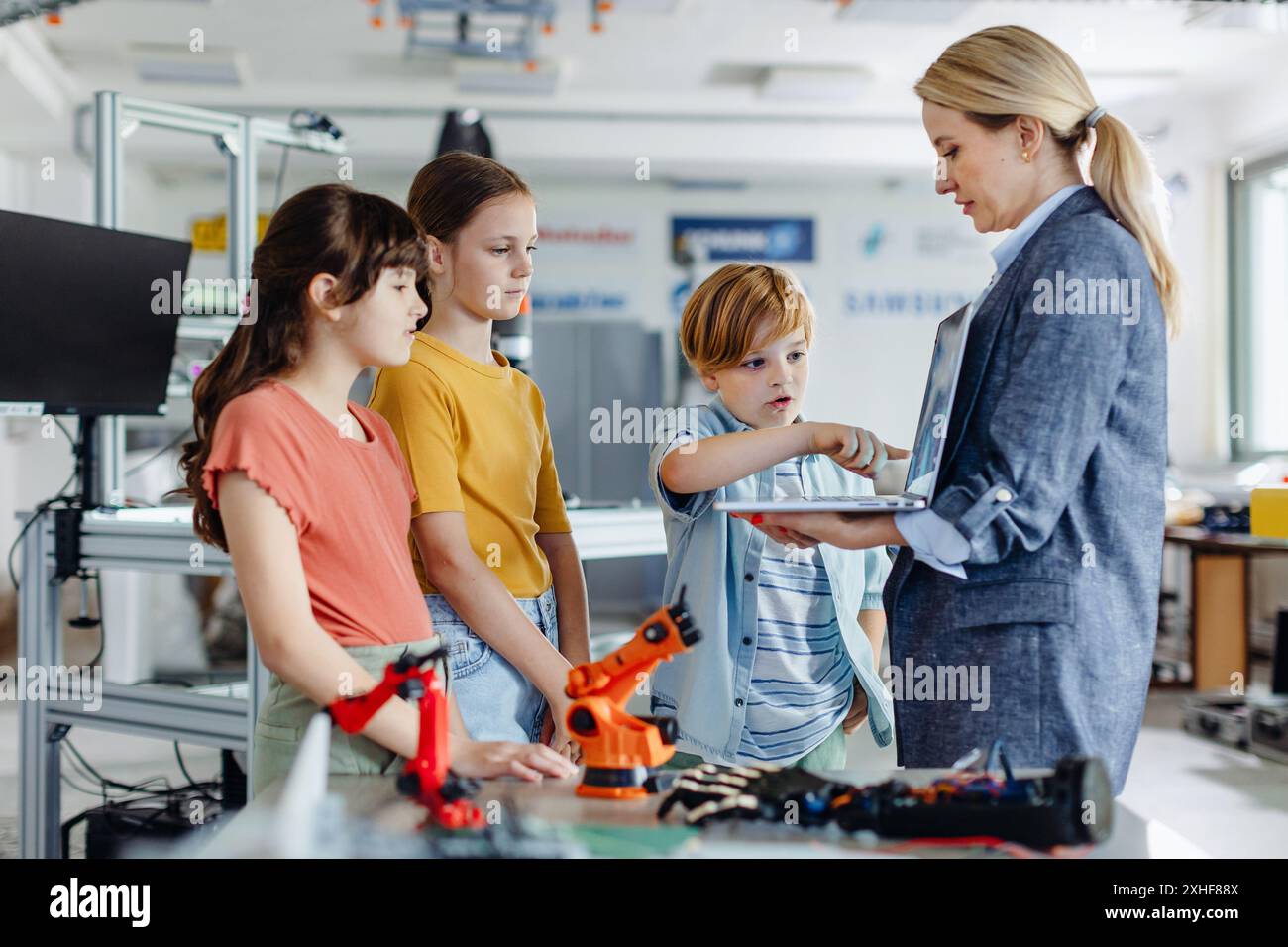 Children learning robotics in Elementary school. Young students ...
