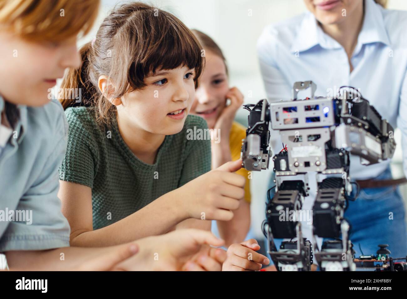 Children learning robotics in Elementary school. Young students ...