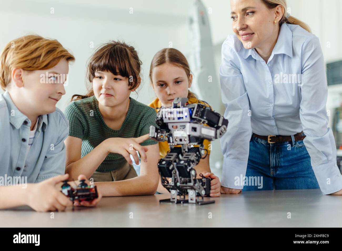 Children learning robotics in Elementary school. Young students ...