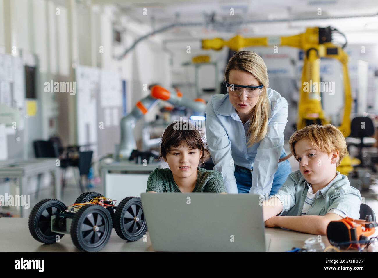 Children learning robotics in Elementary school. Young students ...