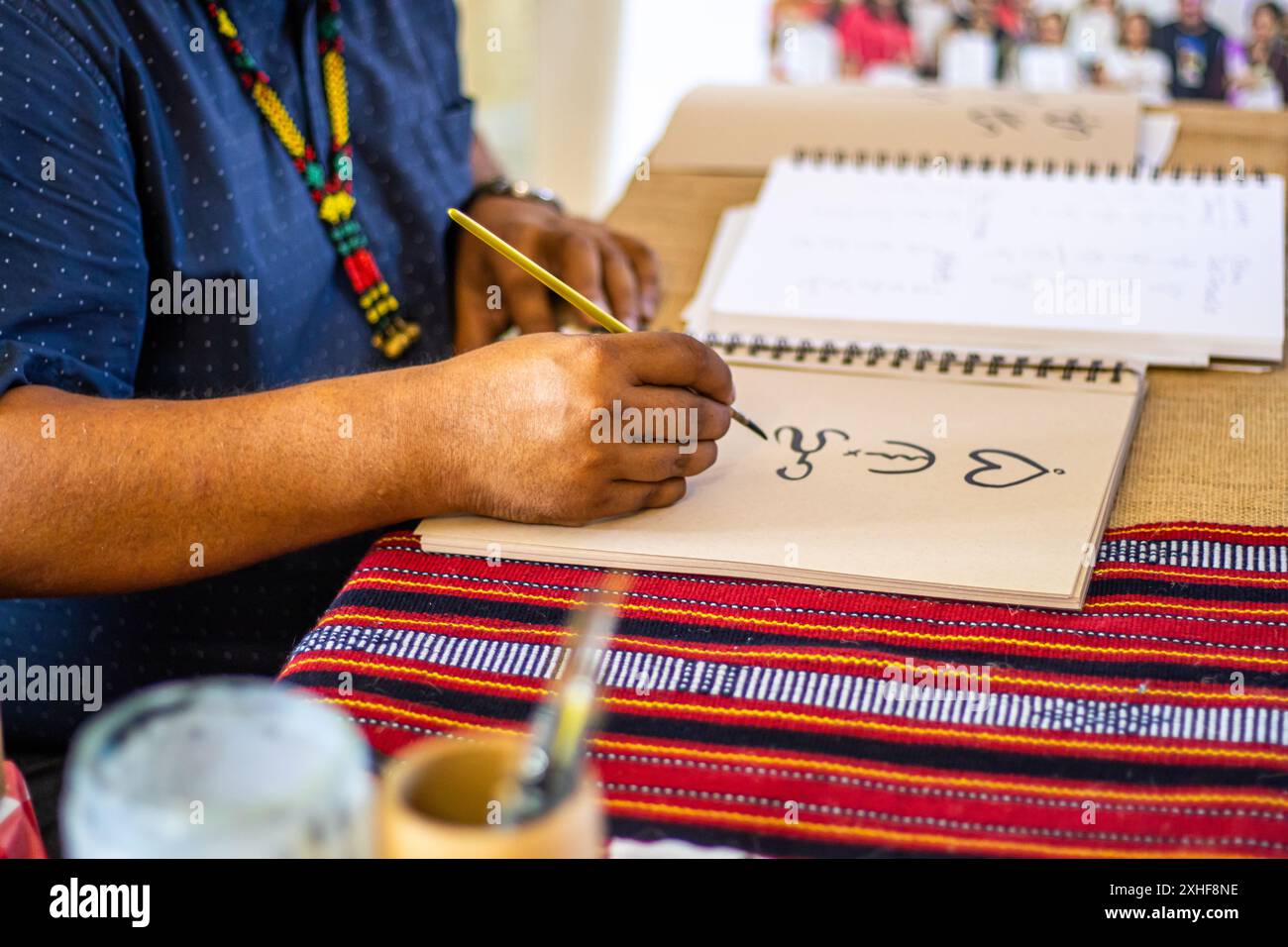 Los Angeles, USA. 13th July, 2024. The artist Eliseo Art Silva writing ...