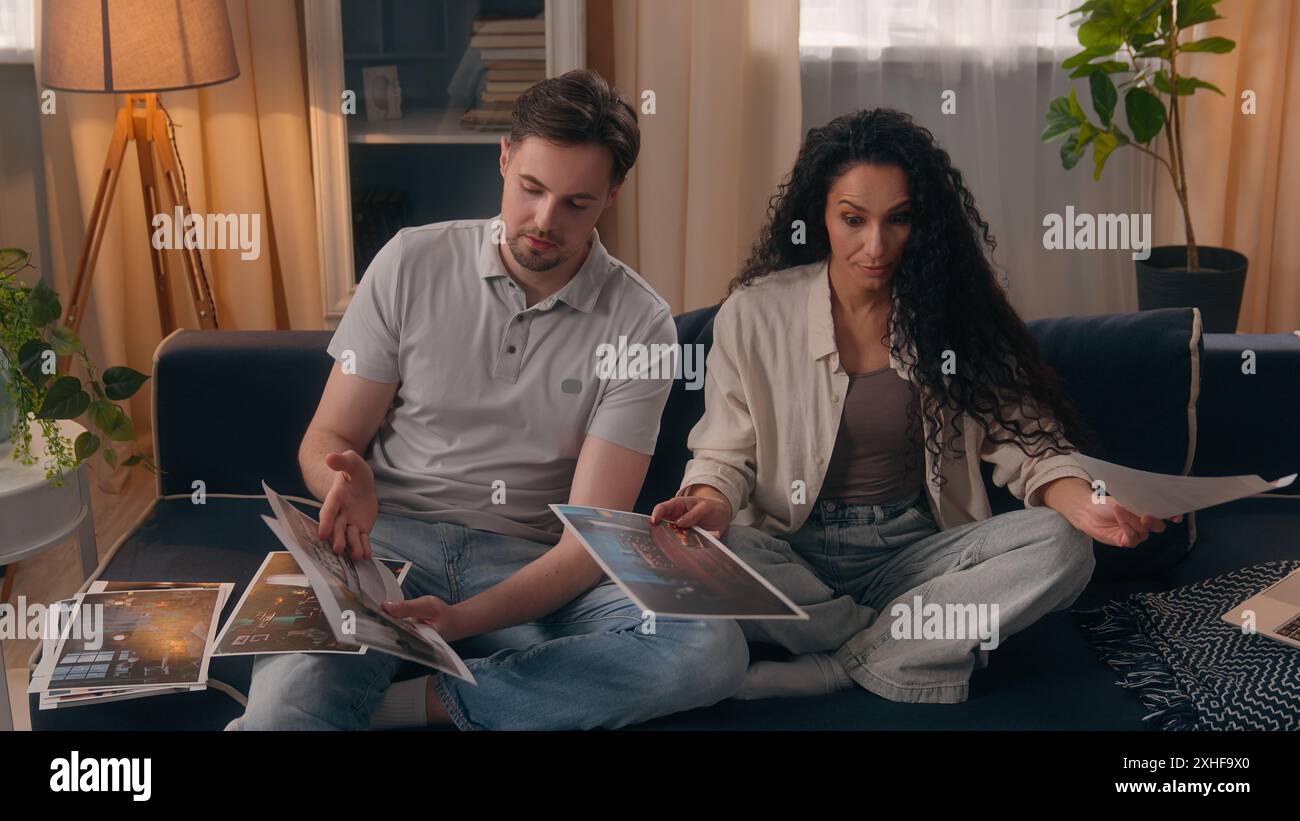 Family relocation repair home house purchase planning couple choose photos of flat interior ...