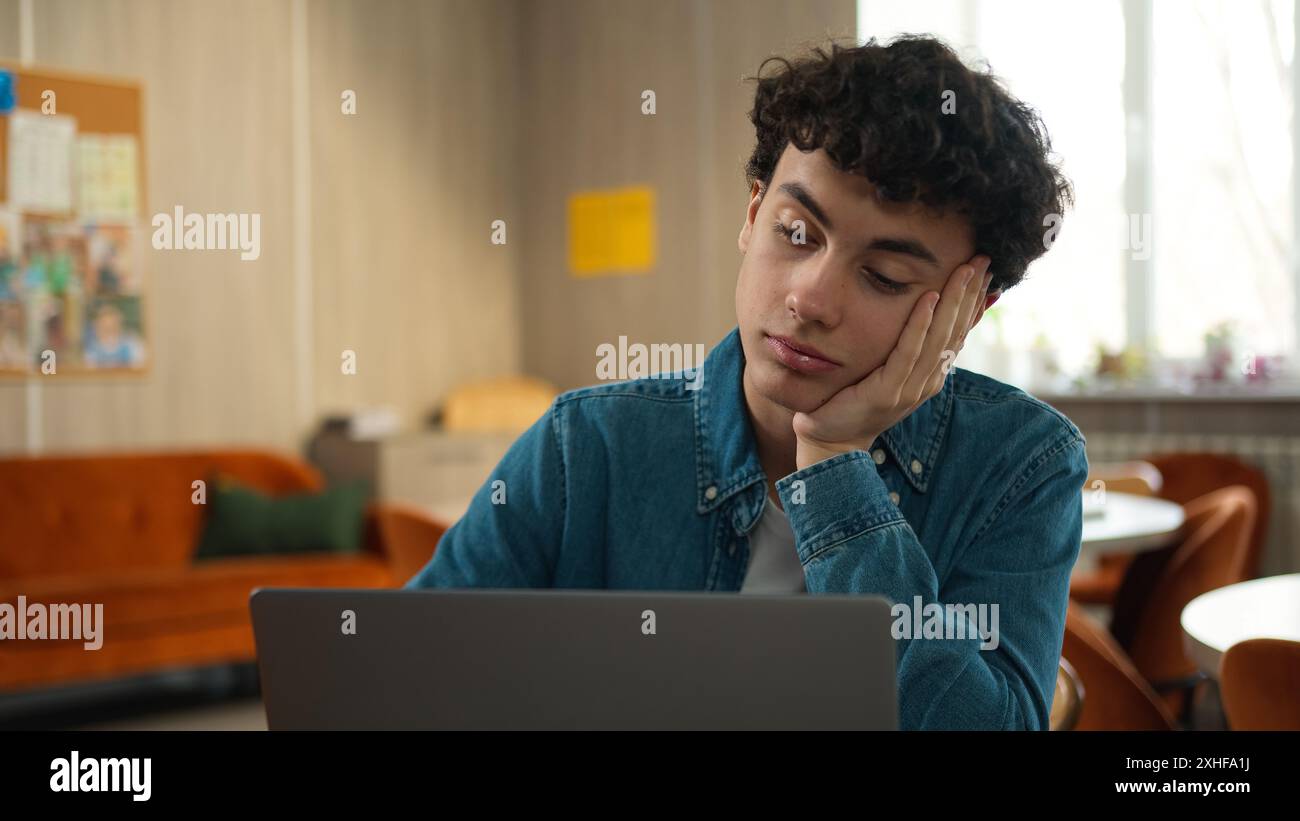 Caucasian tired bored sad upset fatigued man male student guy boy ...