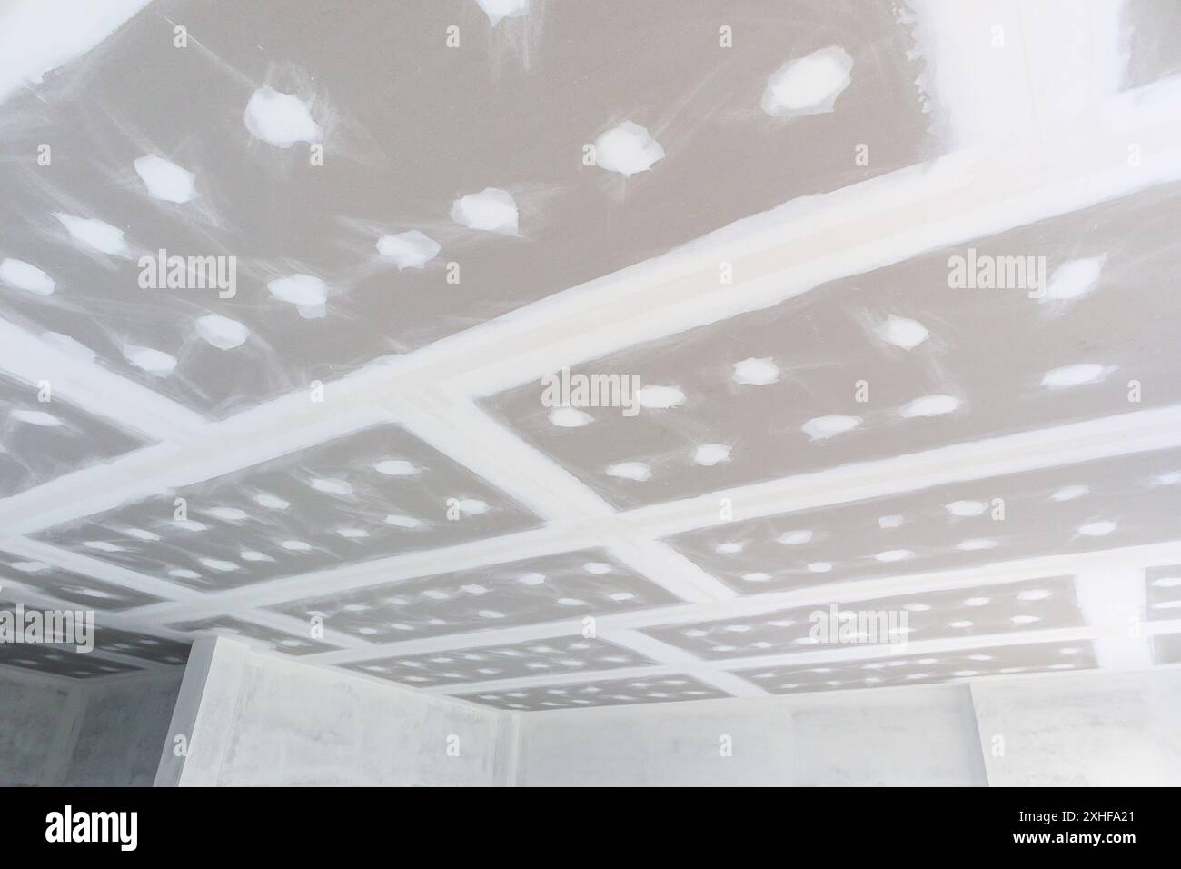 ceiling gypsum board installation at construction site Stock Photo - Alamy