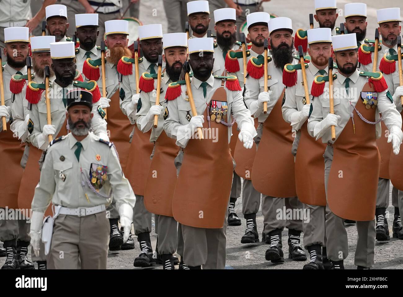 Troops of the Foreign Legion parade during the Bastille Day parade ...