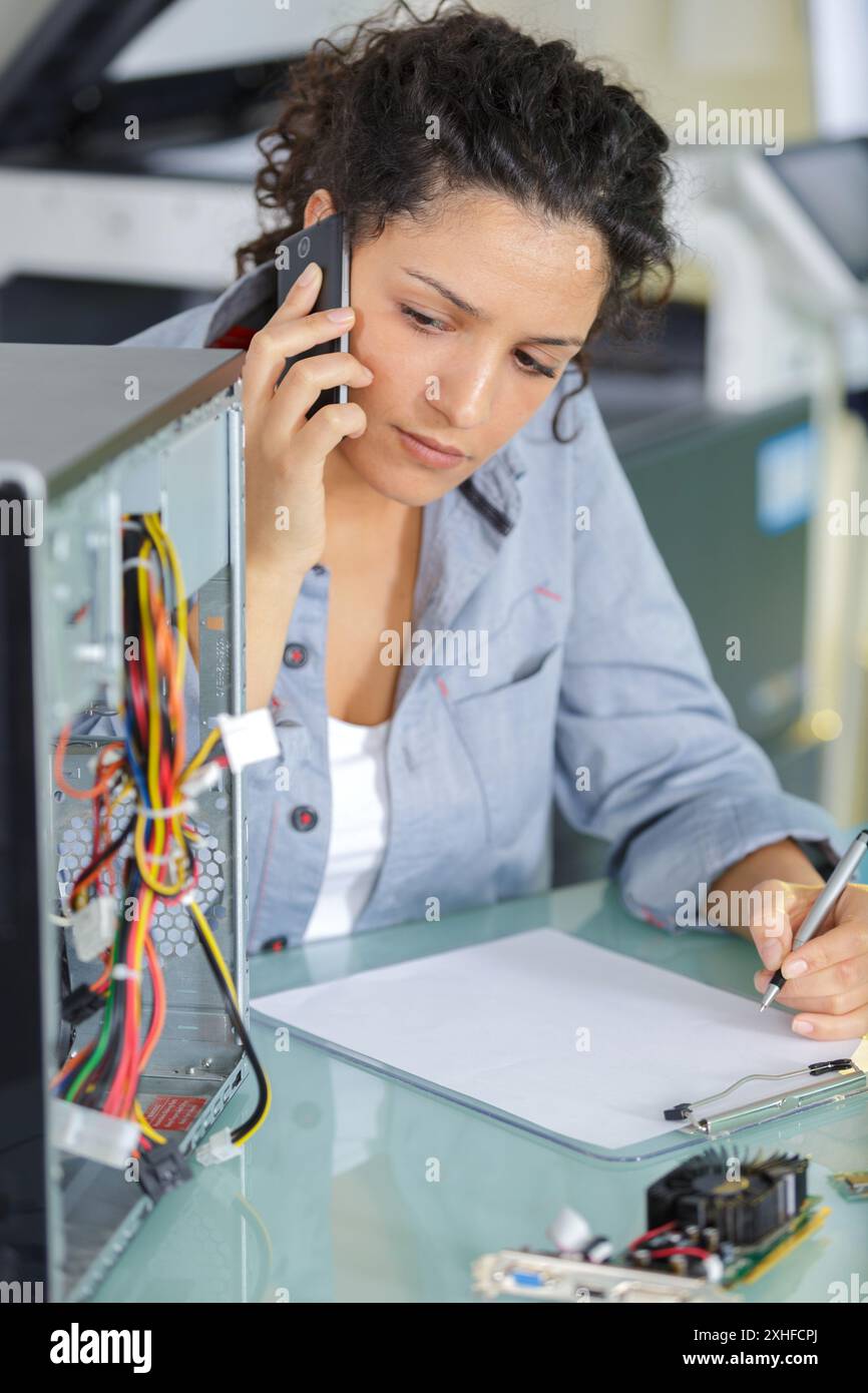 Trying to repair computer hi-res stock photography and images - Alamy